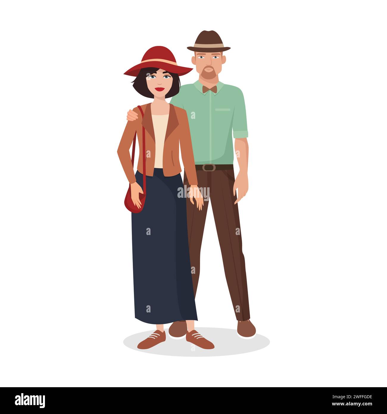 Couple in hipster clothes standing together, man and woman hugging ...