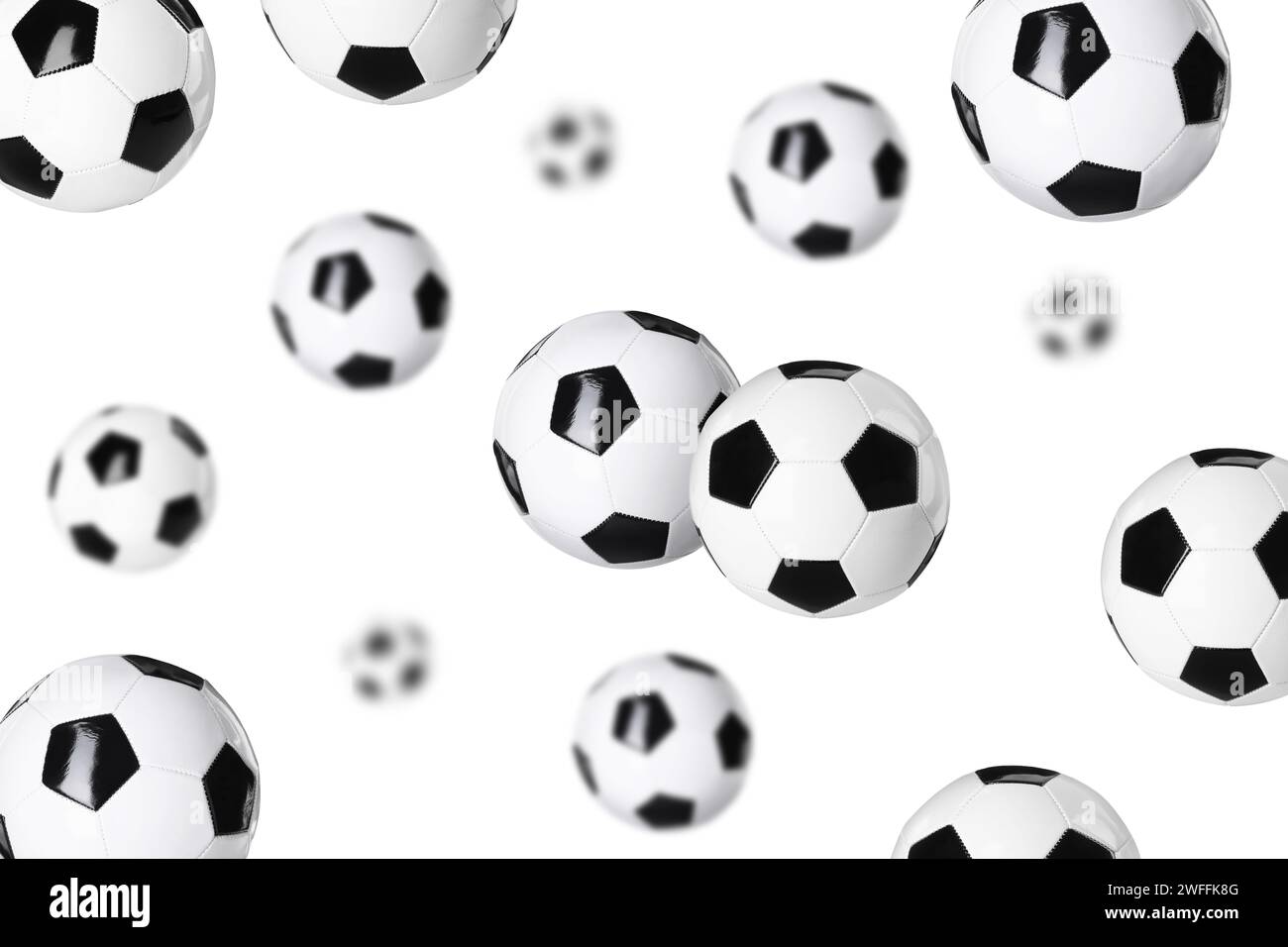 Many soccer balls falling on white background Stock Photo - Alamy