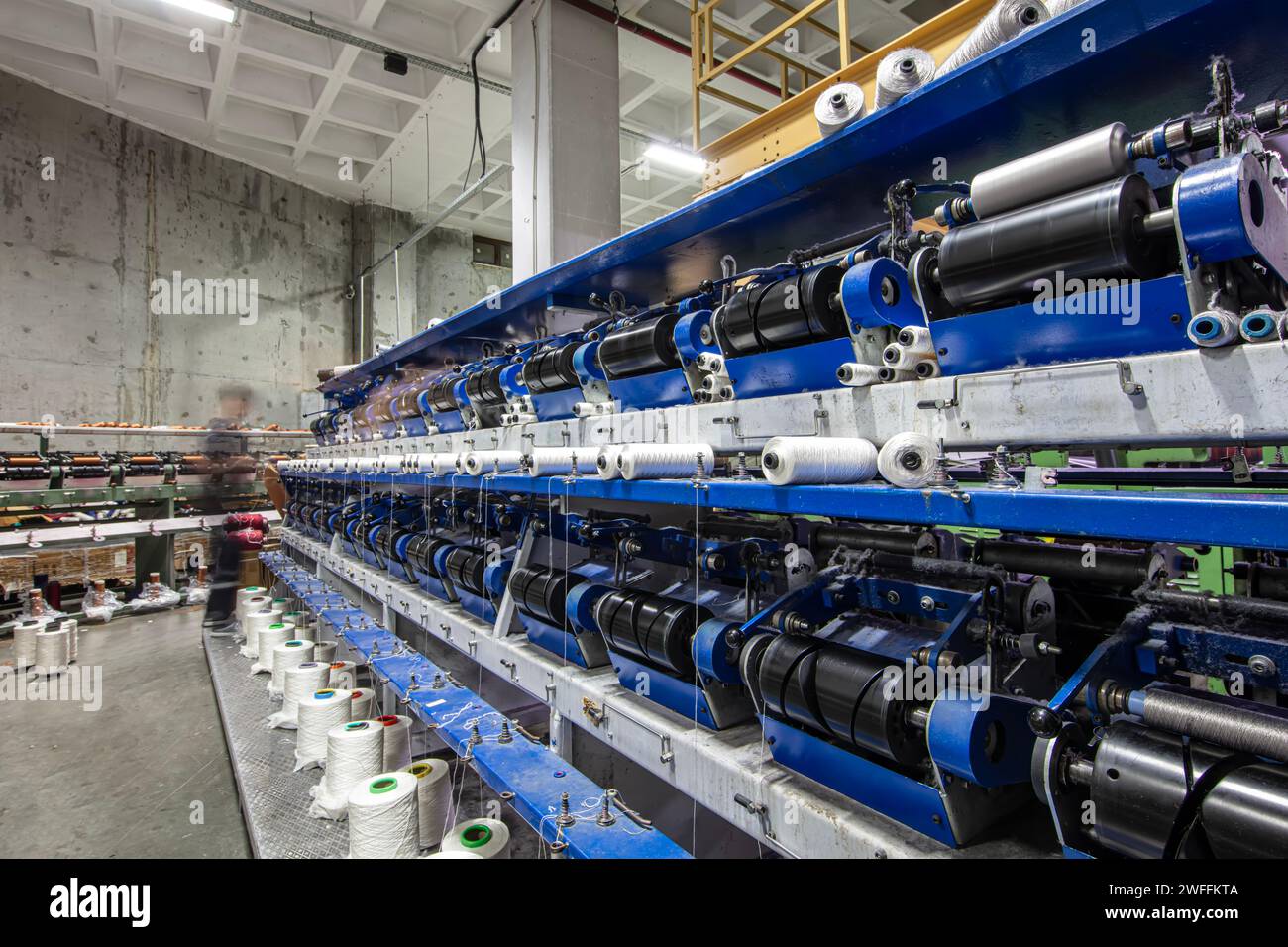 Threading an industrial sewing machine hi-res stock photography and ...