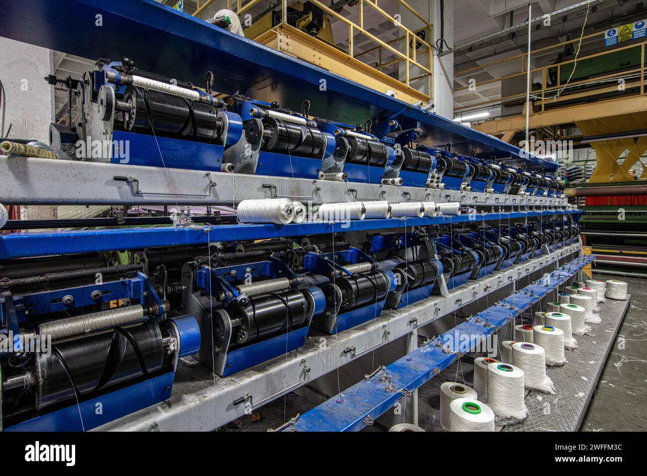Threading an industrial sewing machine hi-res stock photography and ...