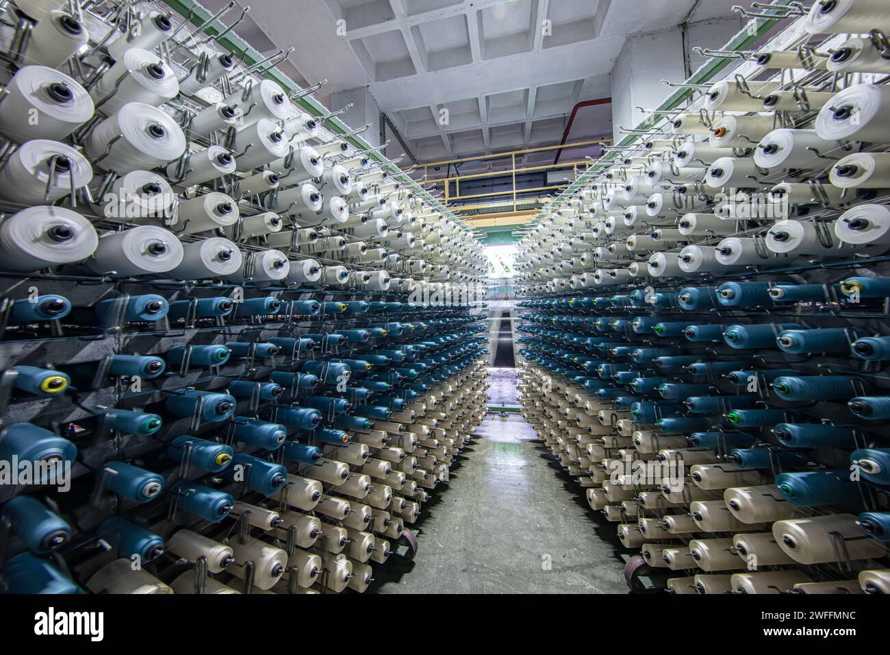 Threading an industrial sewing machine hi-res stock photography and ...