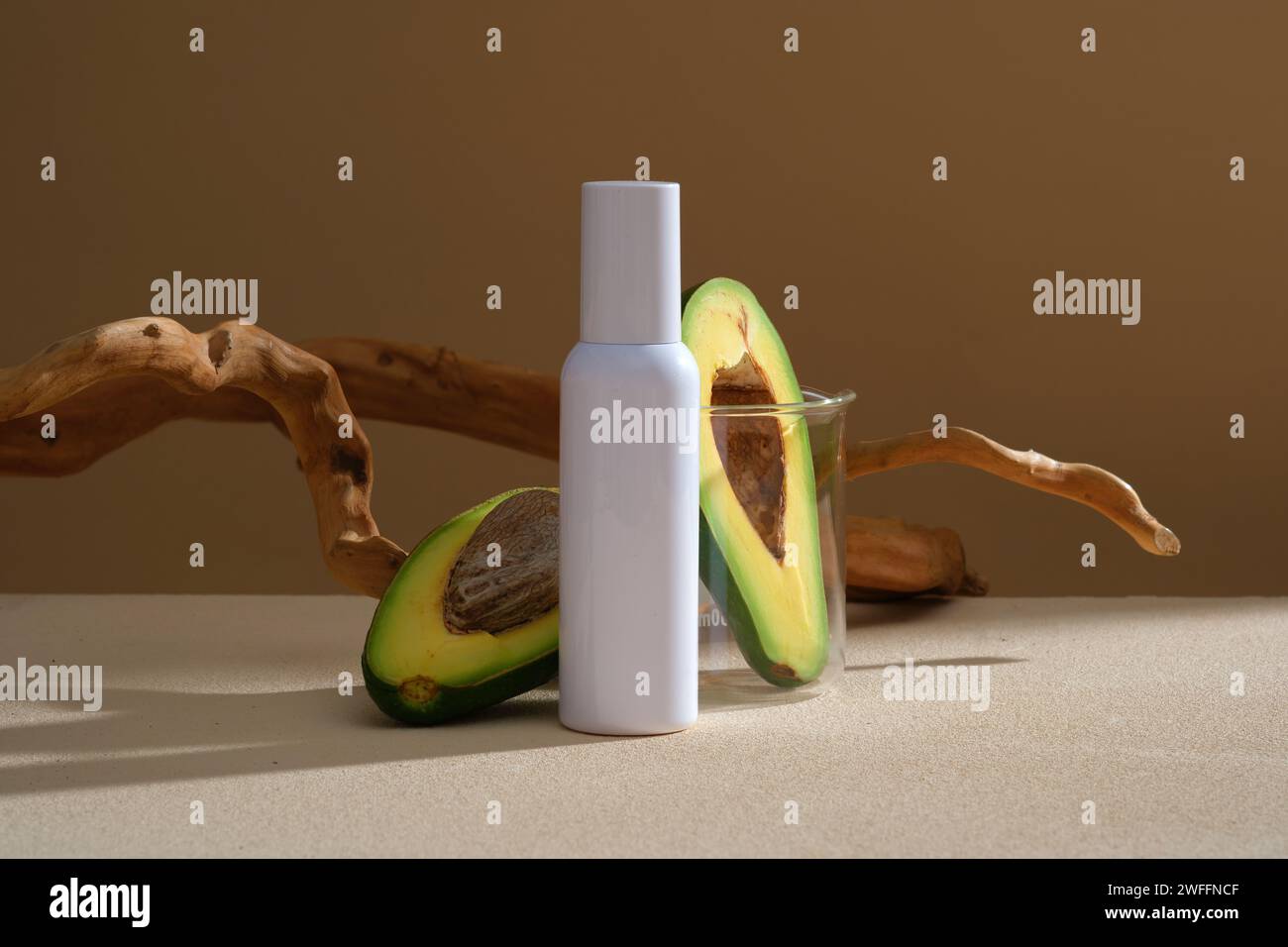 Avocado putted inside a glass transparent beaker, displayed with a ...