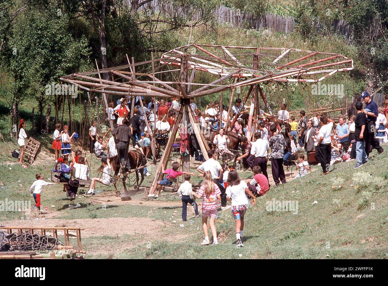 Vrancea County, Romania, approx. 1992. Local people enjoying a ride at ...