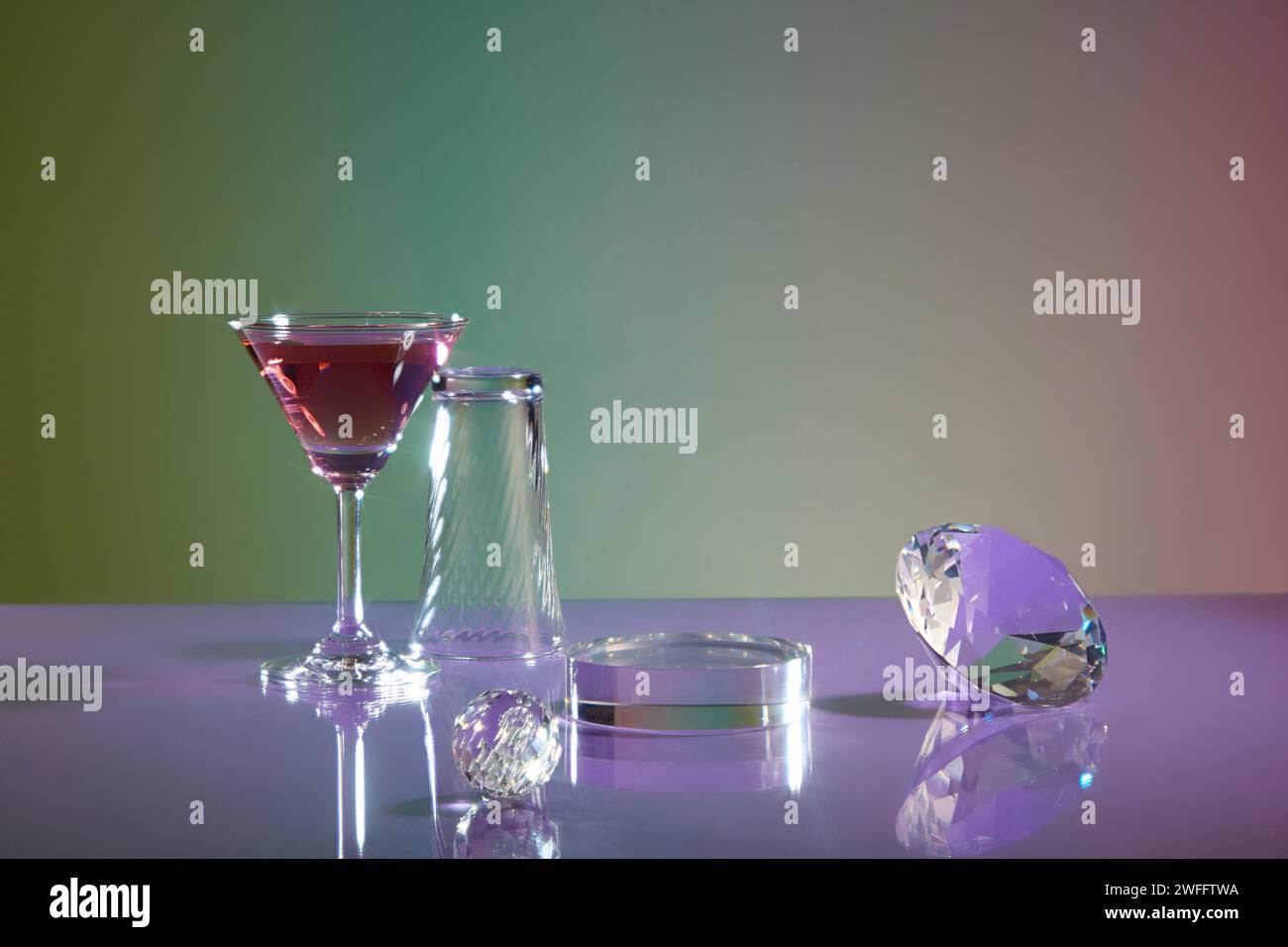 Purple liquid contained inside a cocktail glass arranged with upside ...