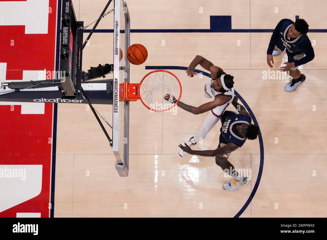 Dayton forward DaRon Holmes II, left, shoots against George Washington ...