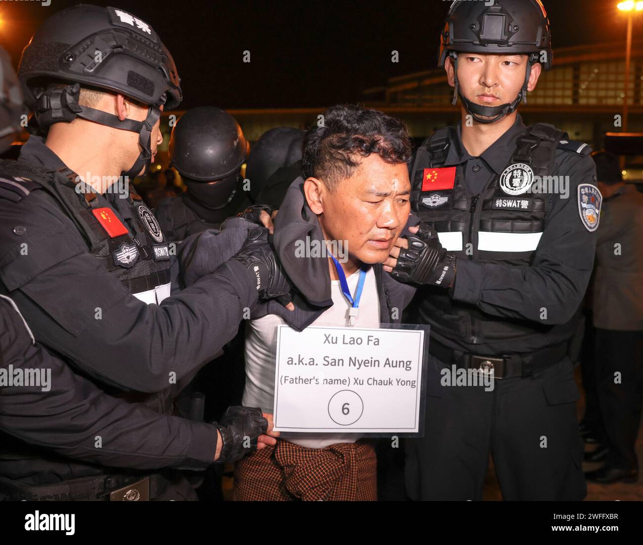 (240131) -- KUNMING, Jan. 31, 2024 (Xinhua) -- Criminal suspect Xu Lao ...