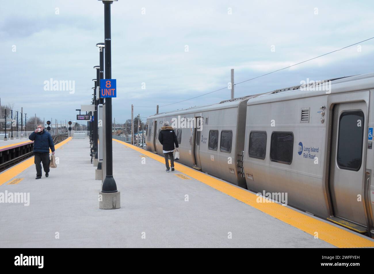 People board the Long Island Rail Road train at the LIRR train station ...