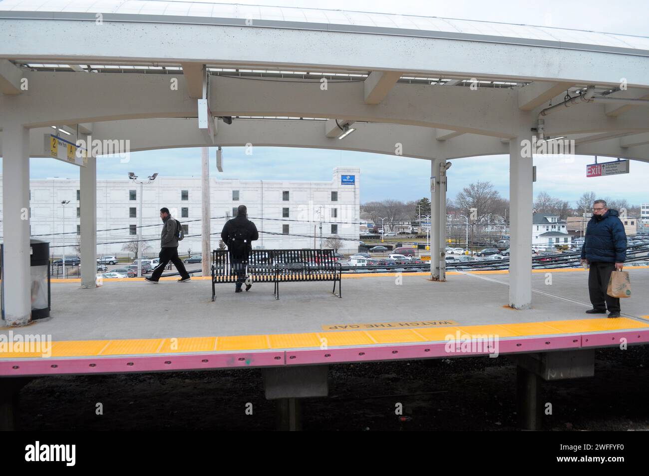 New York, United States. 30th Jan, 2024. People stand on the Long ...