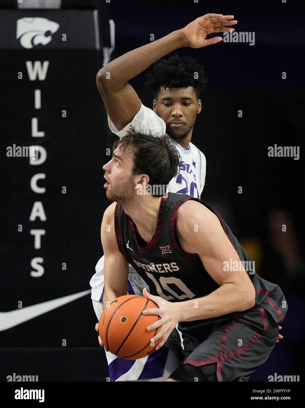 Oklahoma forward Sam Godwin (10) looks to shoot under pressure from ...