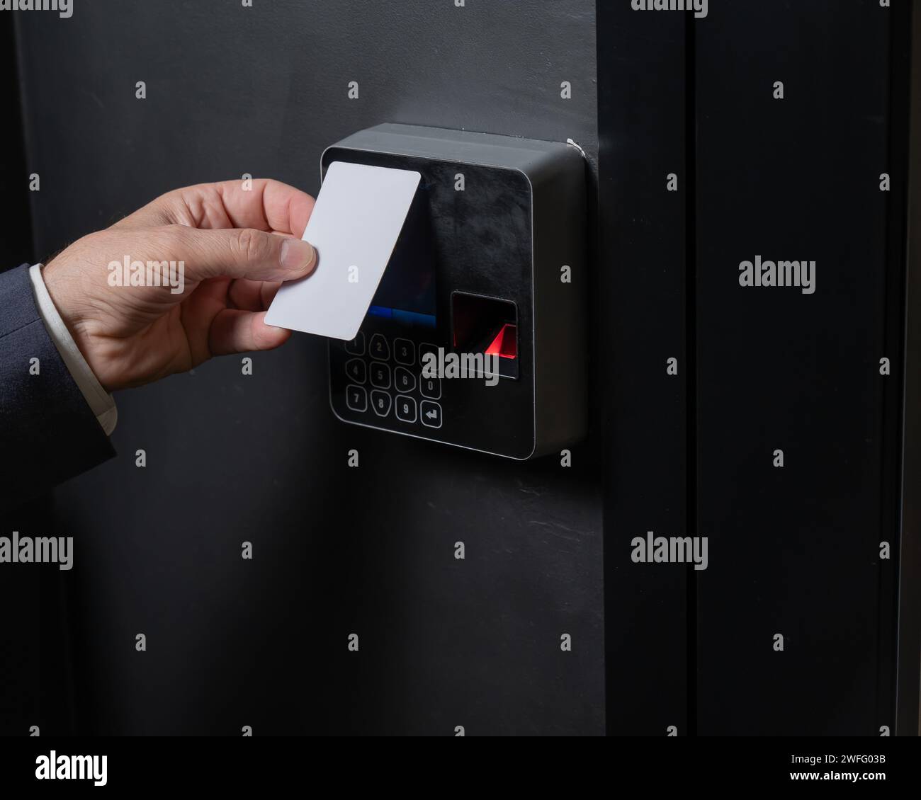 A man opens the door with a card. Modern electronic lock. Keyless Entry ...