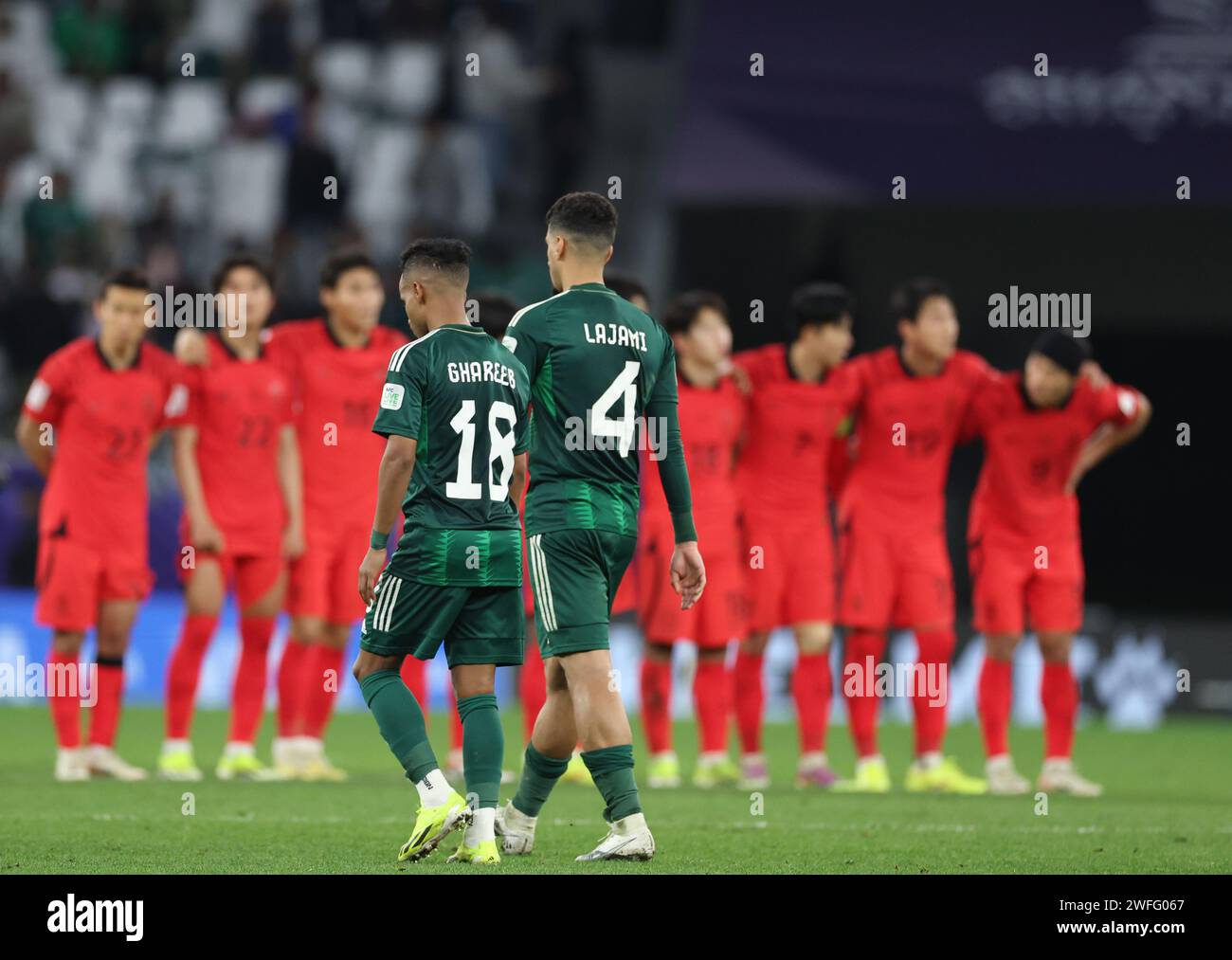Doha, Qatar. 30th Jan, 2024. Abdulrahman Ghareeb (L) and Ali Lajami of ...