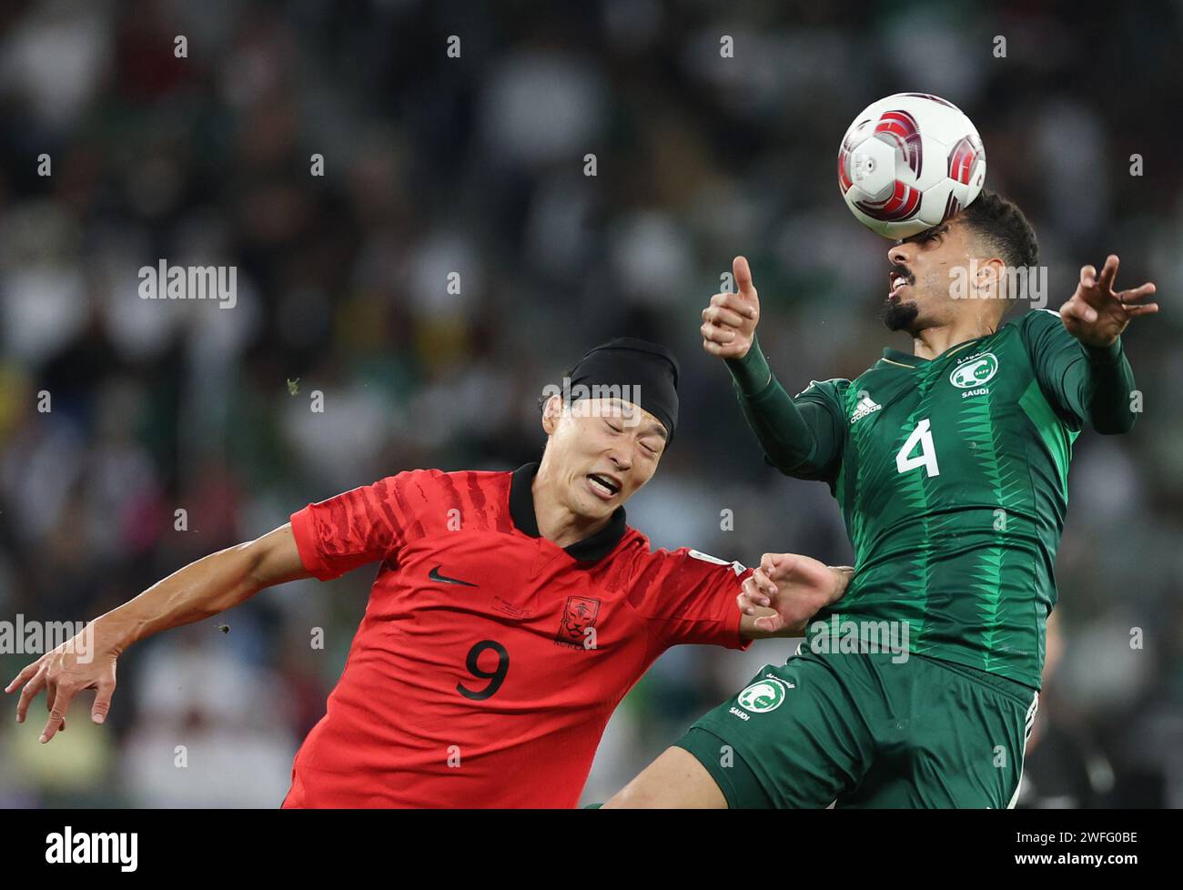 Doha, Qatar. 30th Jan, 2024. Ali Lajami (R) of Saudi Arabia heads the ...