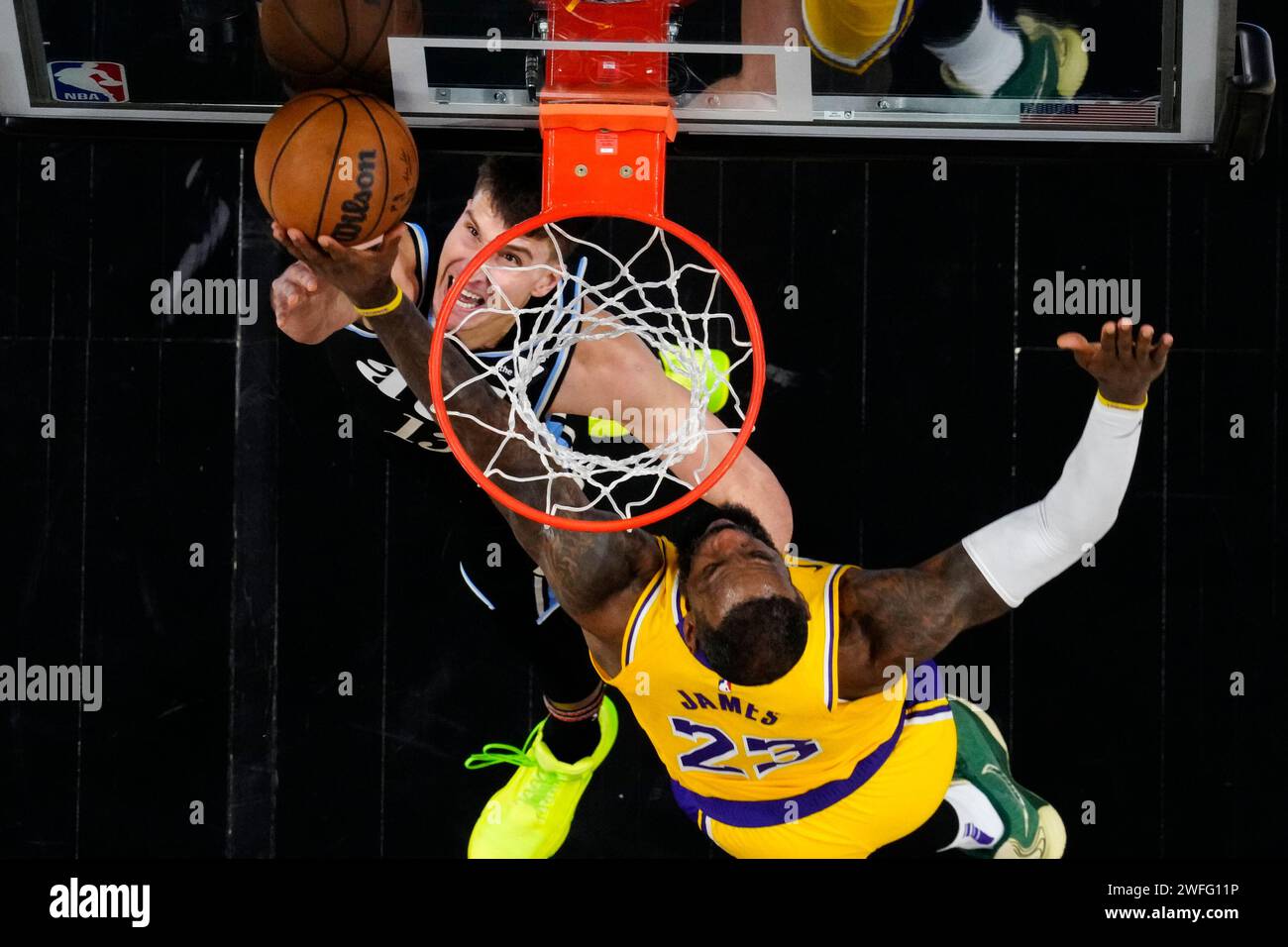 Atlanta Hawks guard Bogdan Bogdanovic (13) has his shot blocked by Los ...