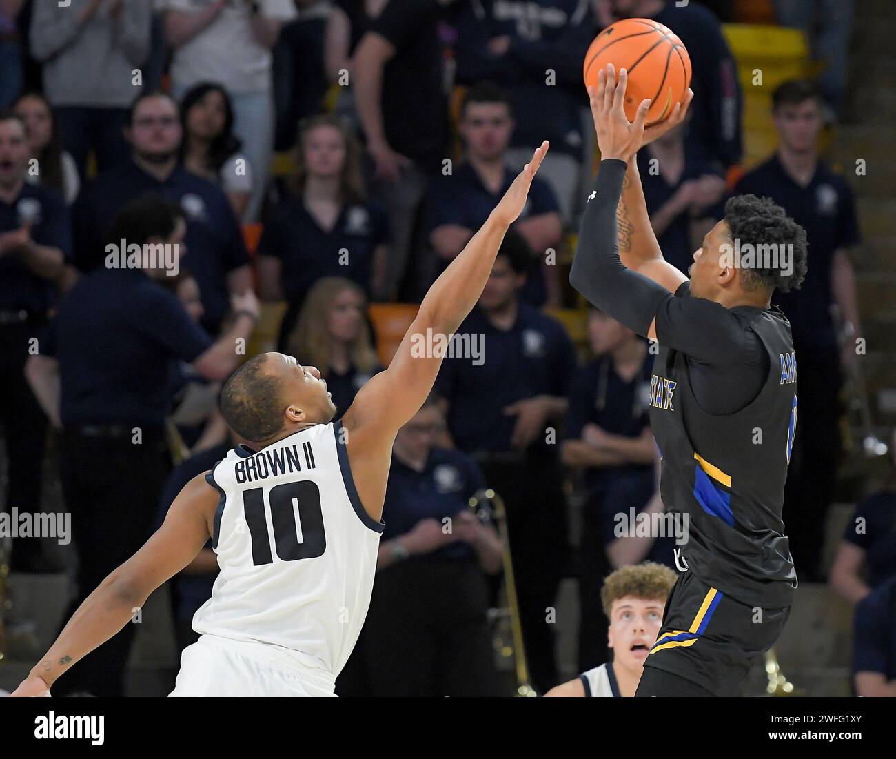 San Jose State guard Myron Amey Jr. shoots the ball as Utah State guard ...