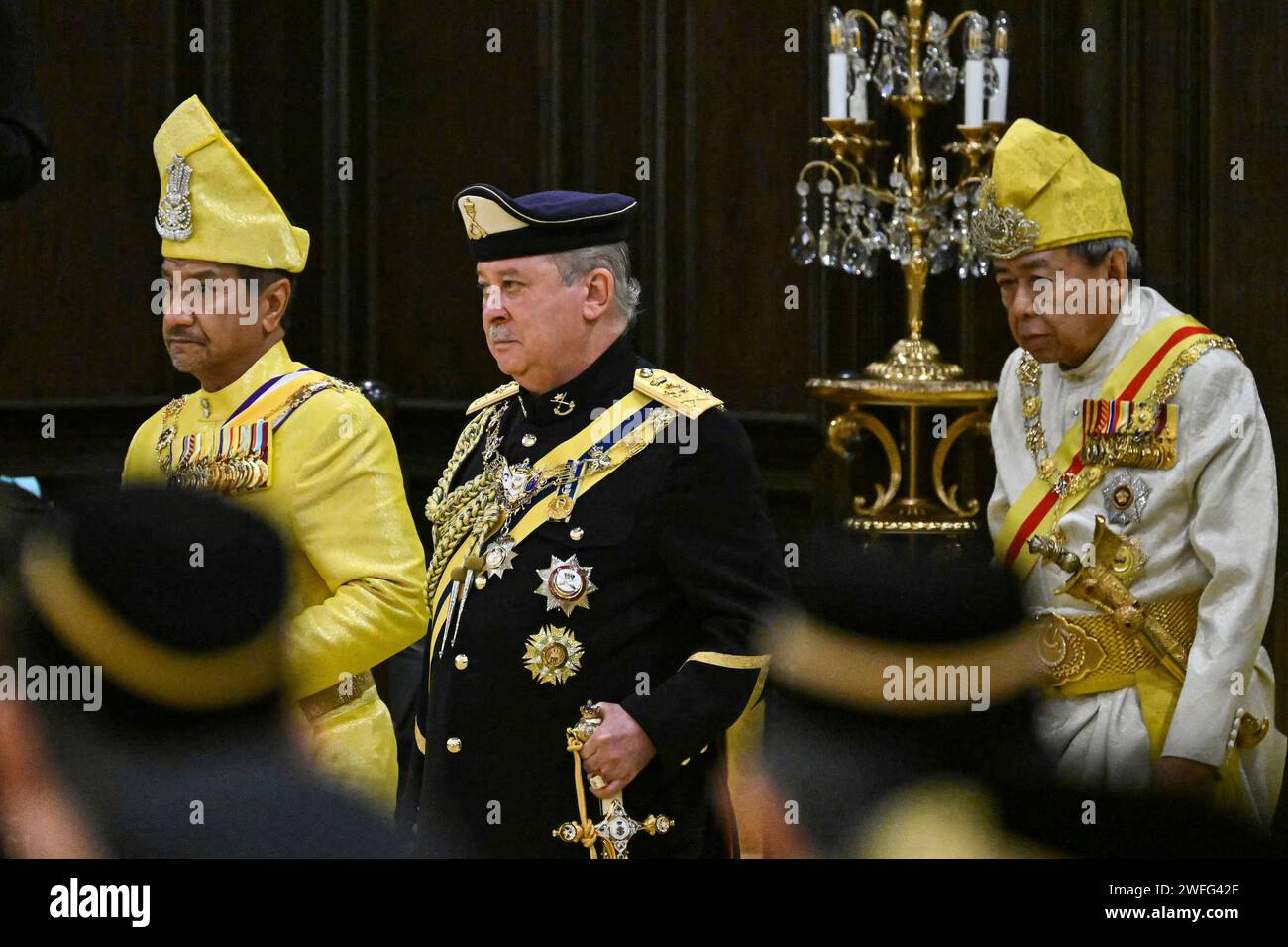 Sultan of Johor, Sultan Ibrahim Iskandar, center, arrives to take part ...