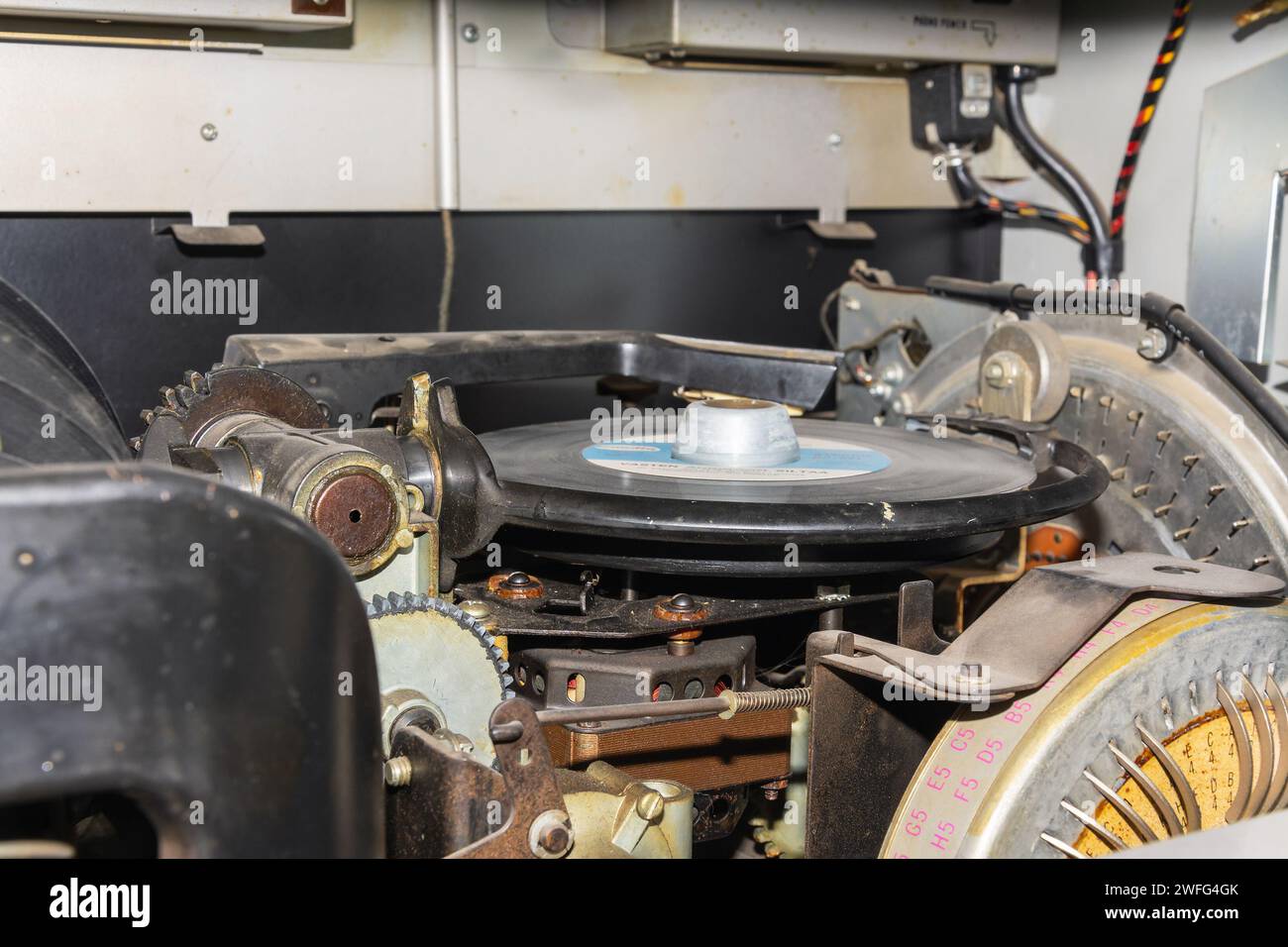 Old Rock-Ola jukebox dusty and greasy internals Stock Photo - Alamy