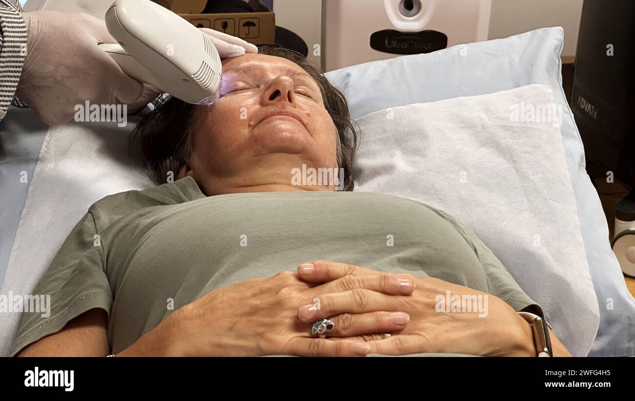 Facial therapy woman receiving hi-res stock photography and images - Alamy