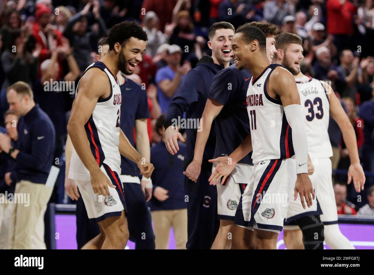 Gonzaga guard Nolan Hickman (11) celebrates with forward Colby Brooks ...
