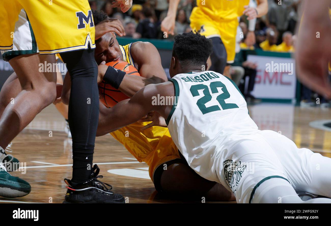 Michigan forward Tarris Reed Jr., left, and Michigan State center Mady ...