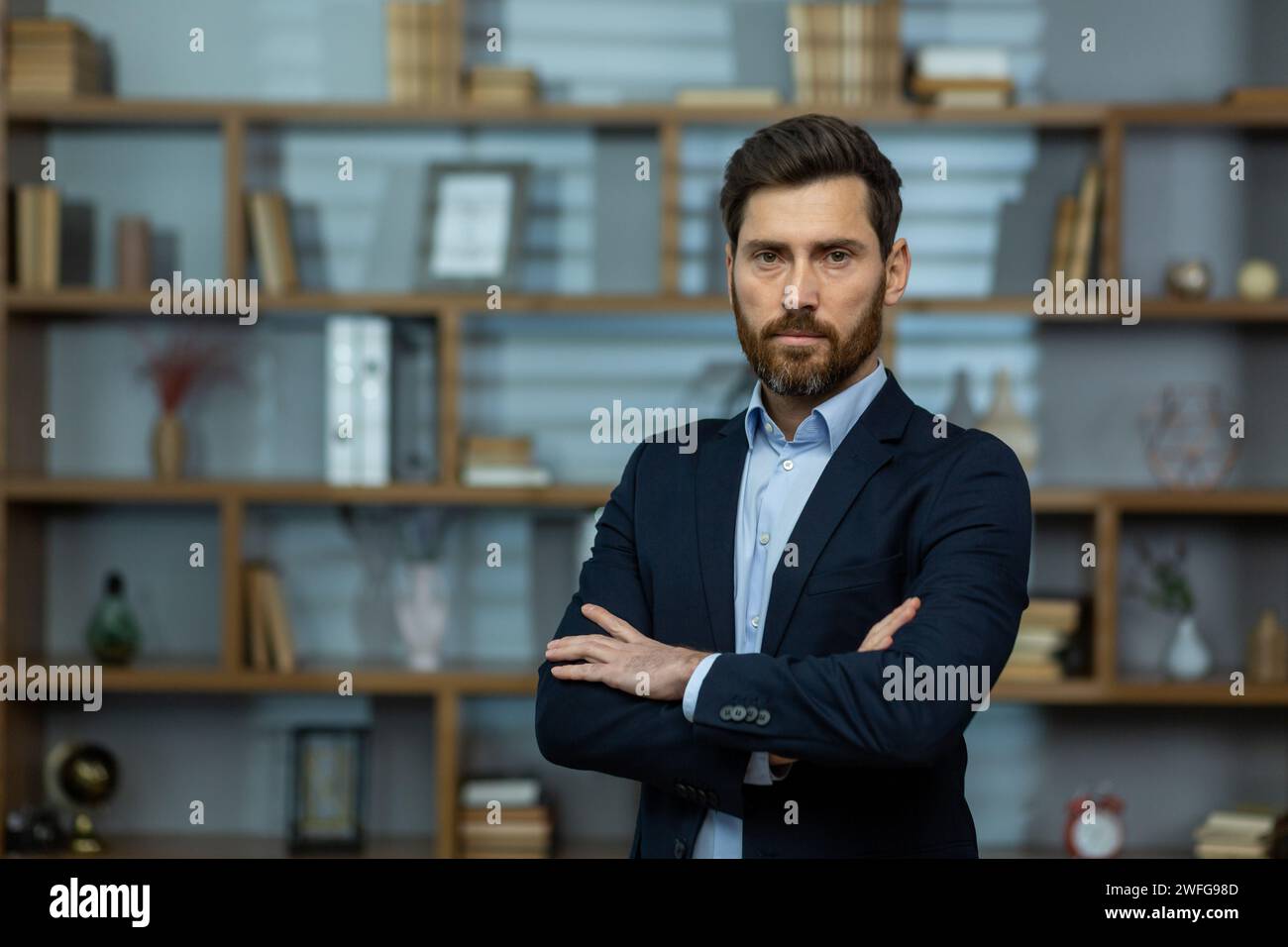 Serious middle age man looking at camera with disapproving facial ...