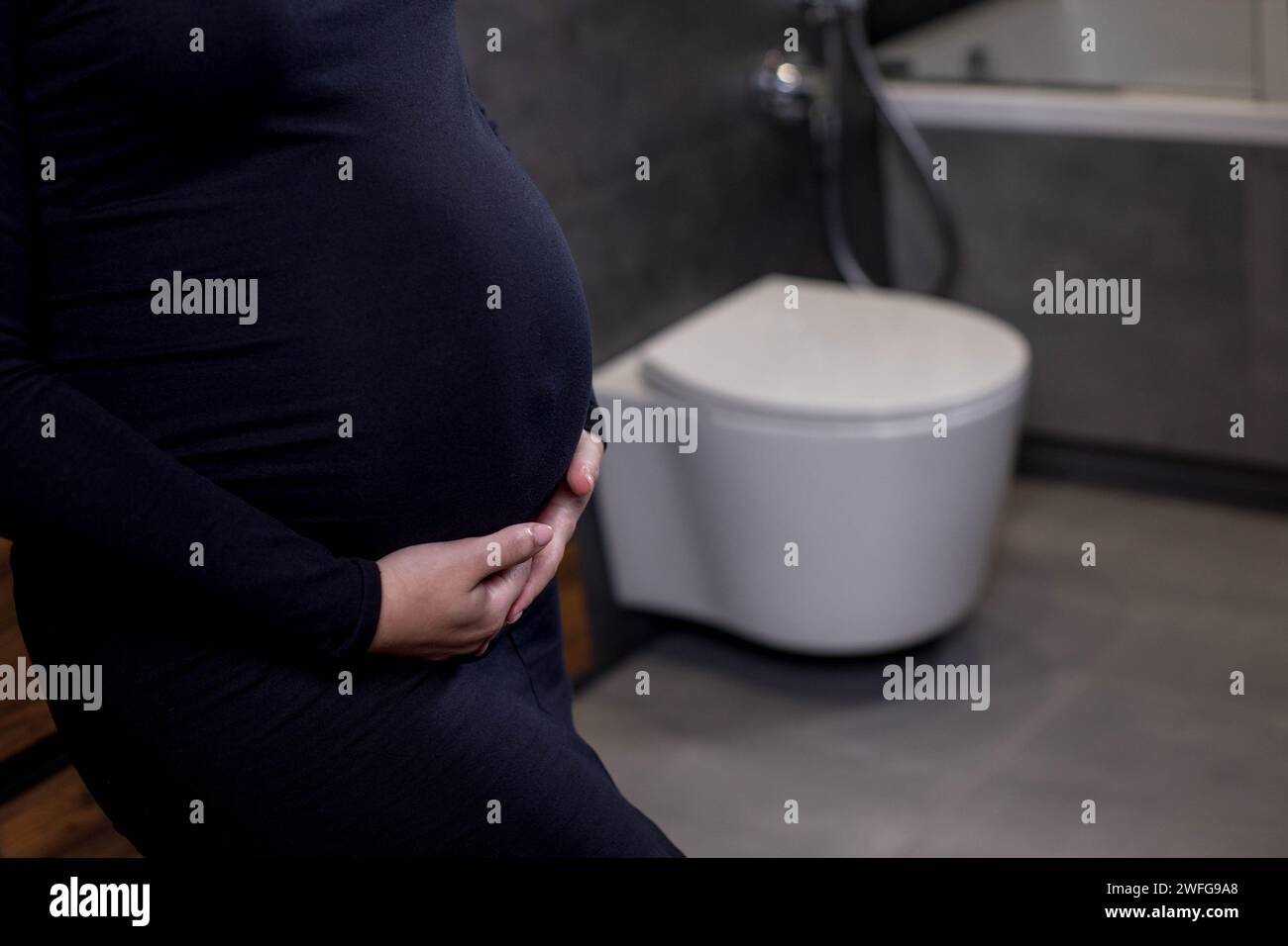 woman with big abdomen in the toilet have problems with chronic ...