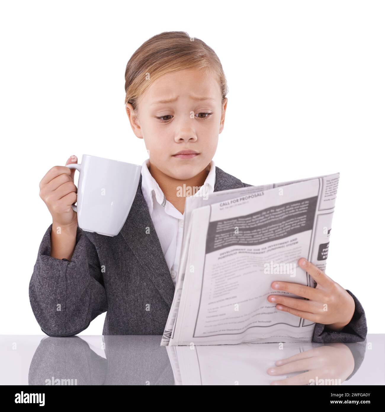 Shocked child, reading newspaper or studio with confused for business ...