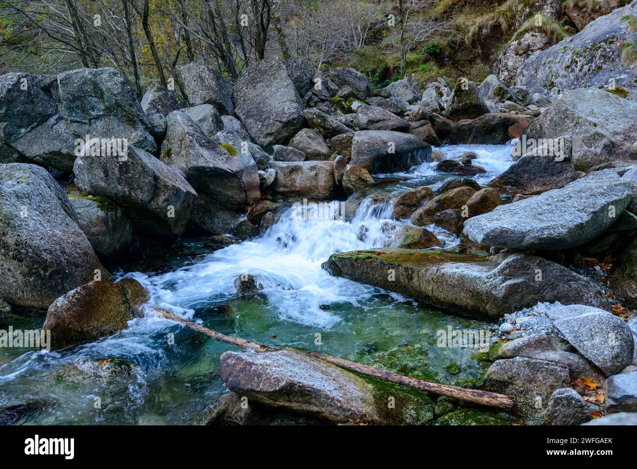 View of a stream winding through rocks Stock Photo - Alamy