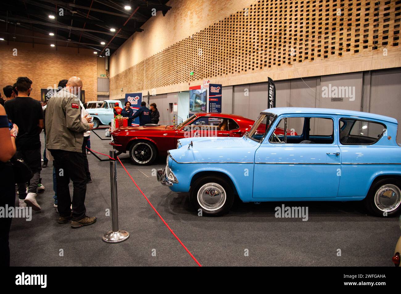 Bogota, Colombia. 27th Jan, 2024. People gather to see classic cars ...
