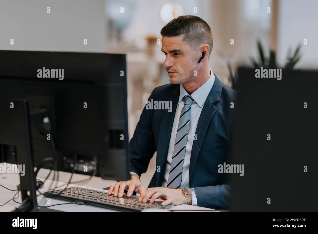 Businessman confident young using hi-res stock photography and images ...