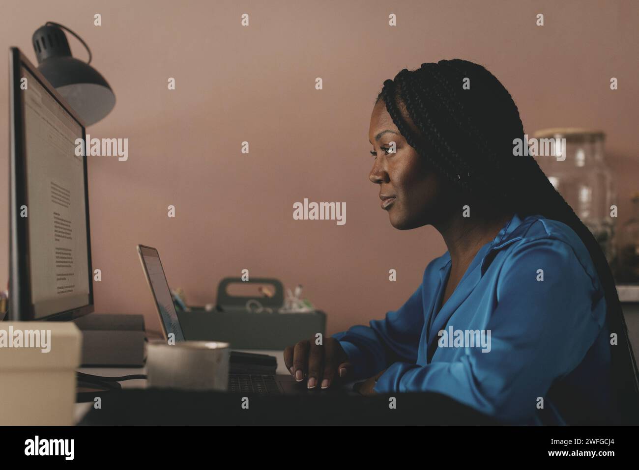 Professional working women in blue hi-res stock photography and images ...
