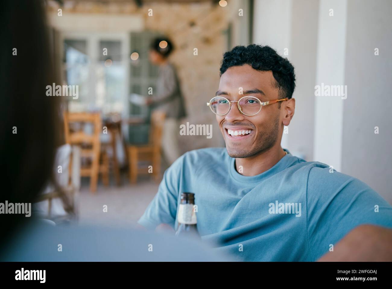 Eyeglasses back woman sitting talking hi-res stock photography and ...