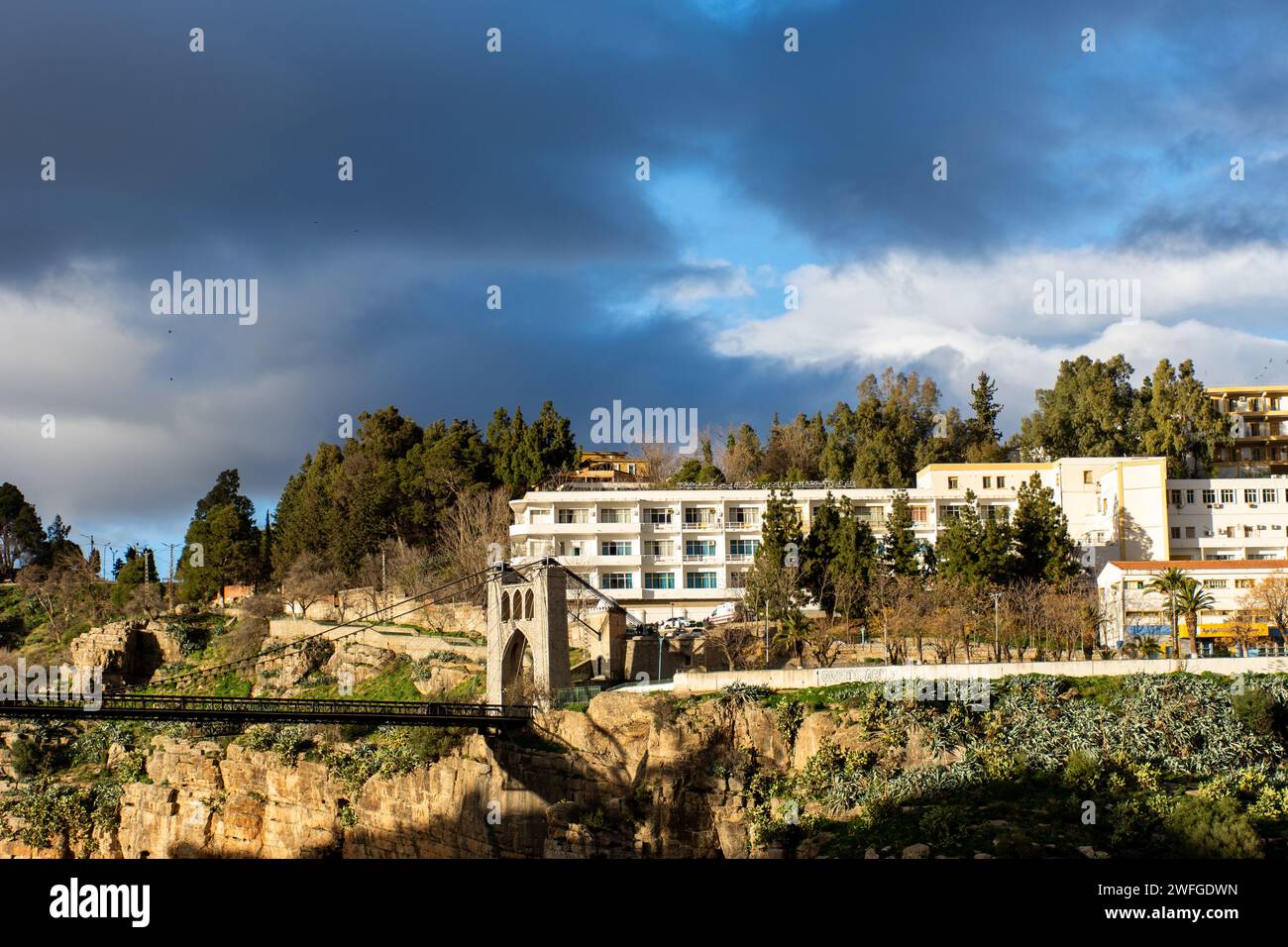 Low-angle view of Sidi M'Cid Bridge the suspension bridge in ...