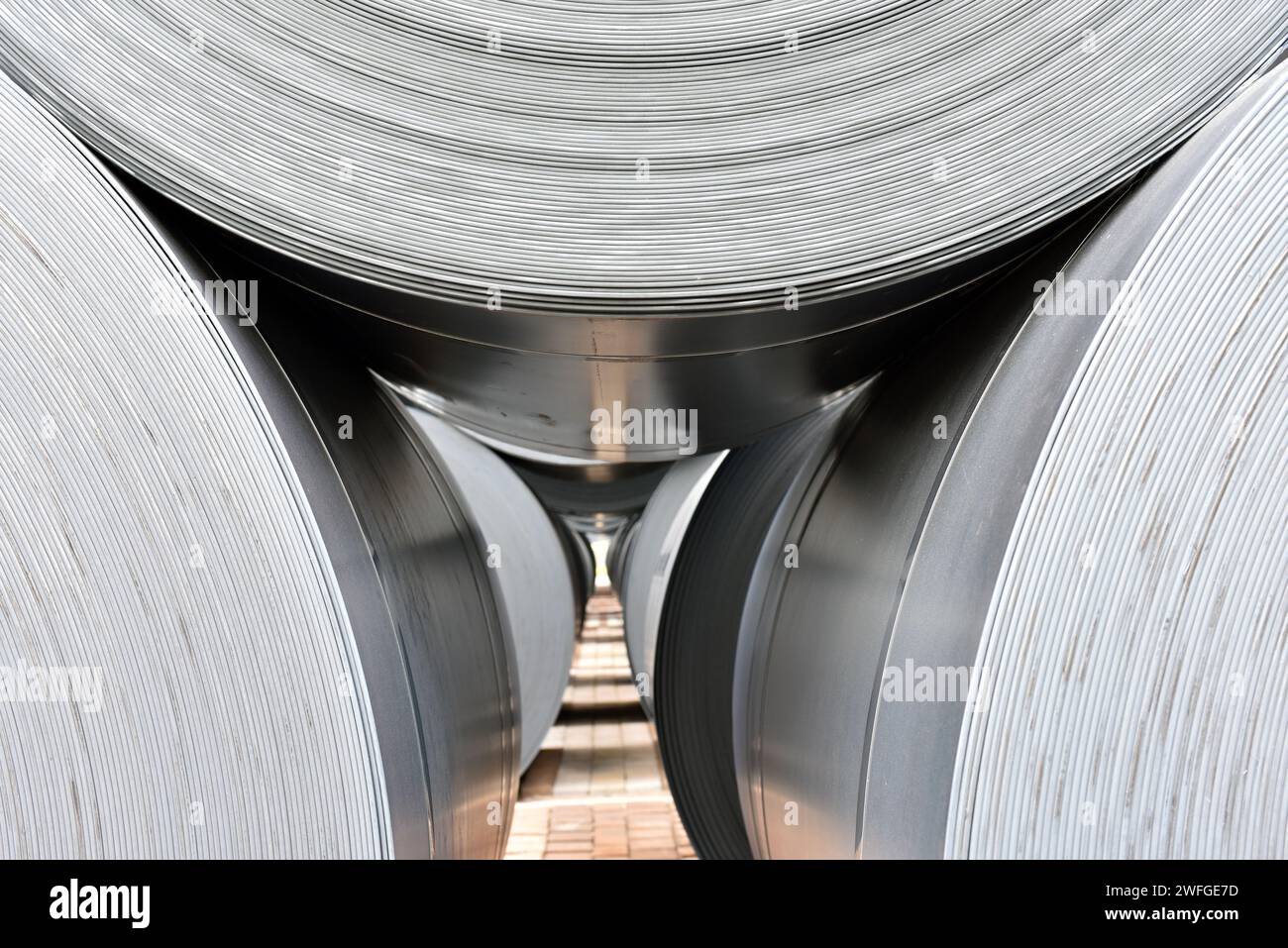 industrial plant for the production of sheet metal in a steel mill ...