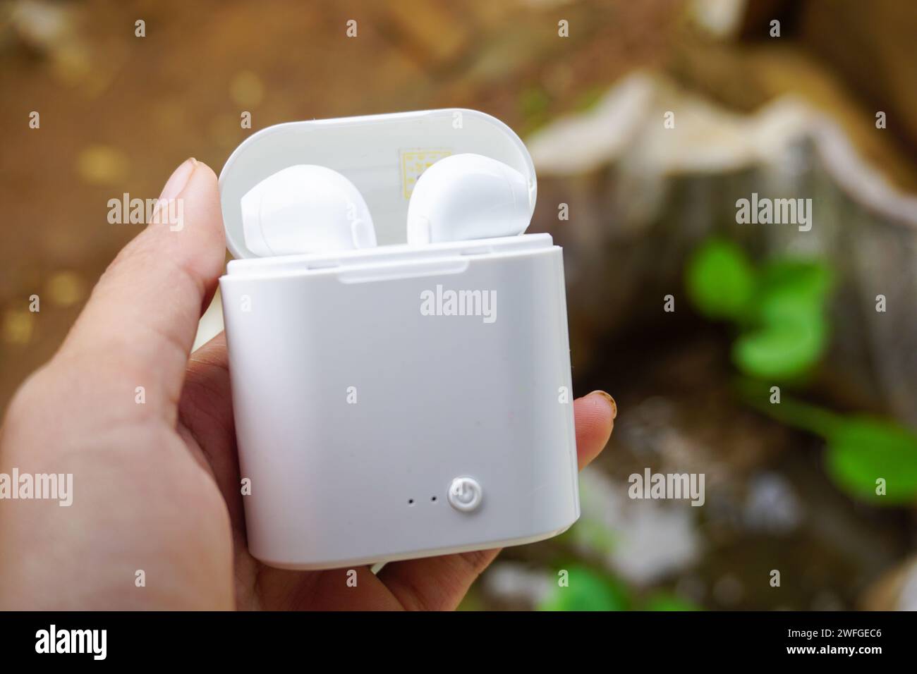 White earphones stock photo of wireless earphones isolated on white ...
