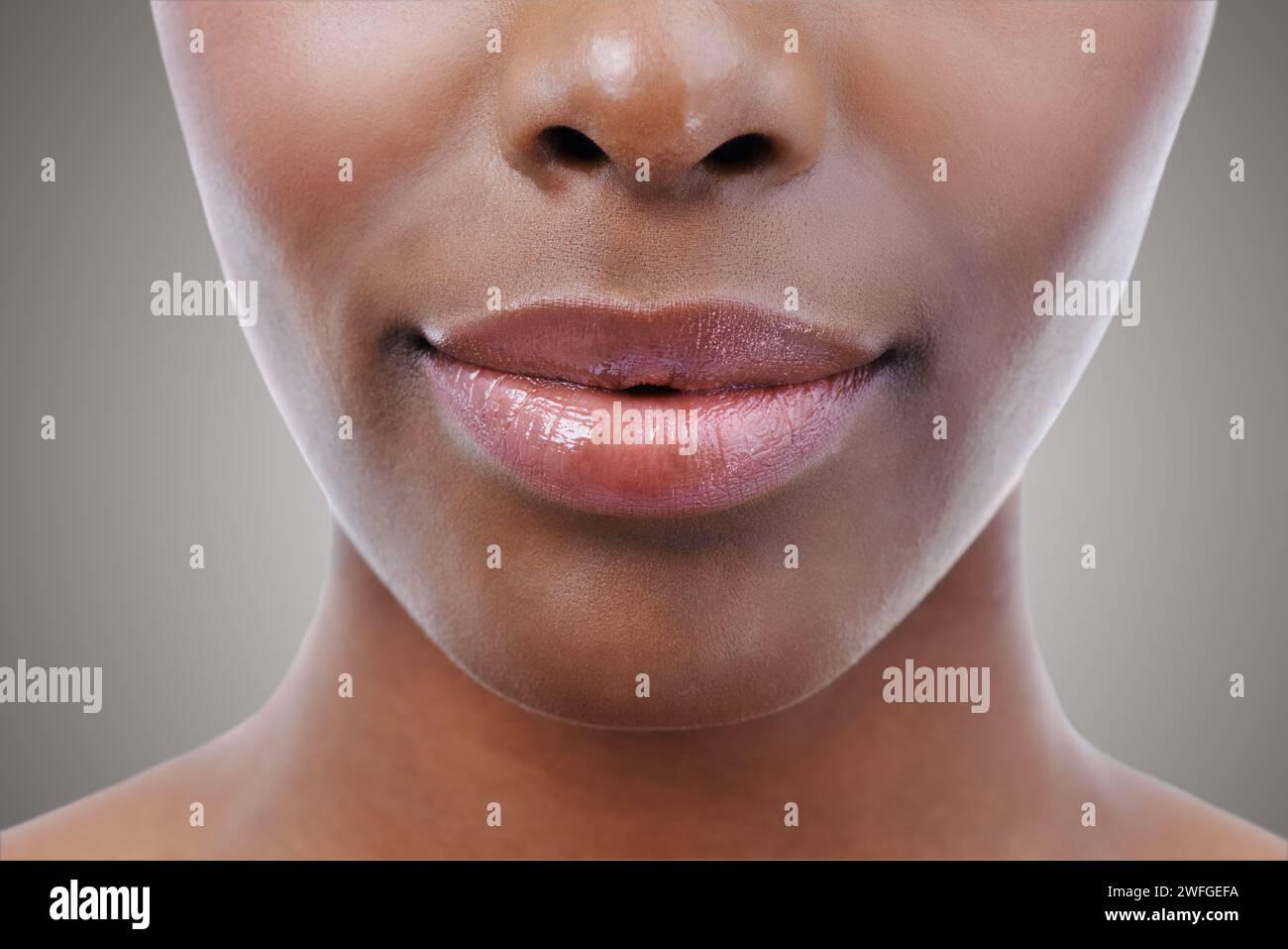 Cosmetics, beauty and lips of black woman on gray background for ...