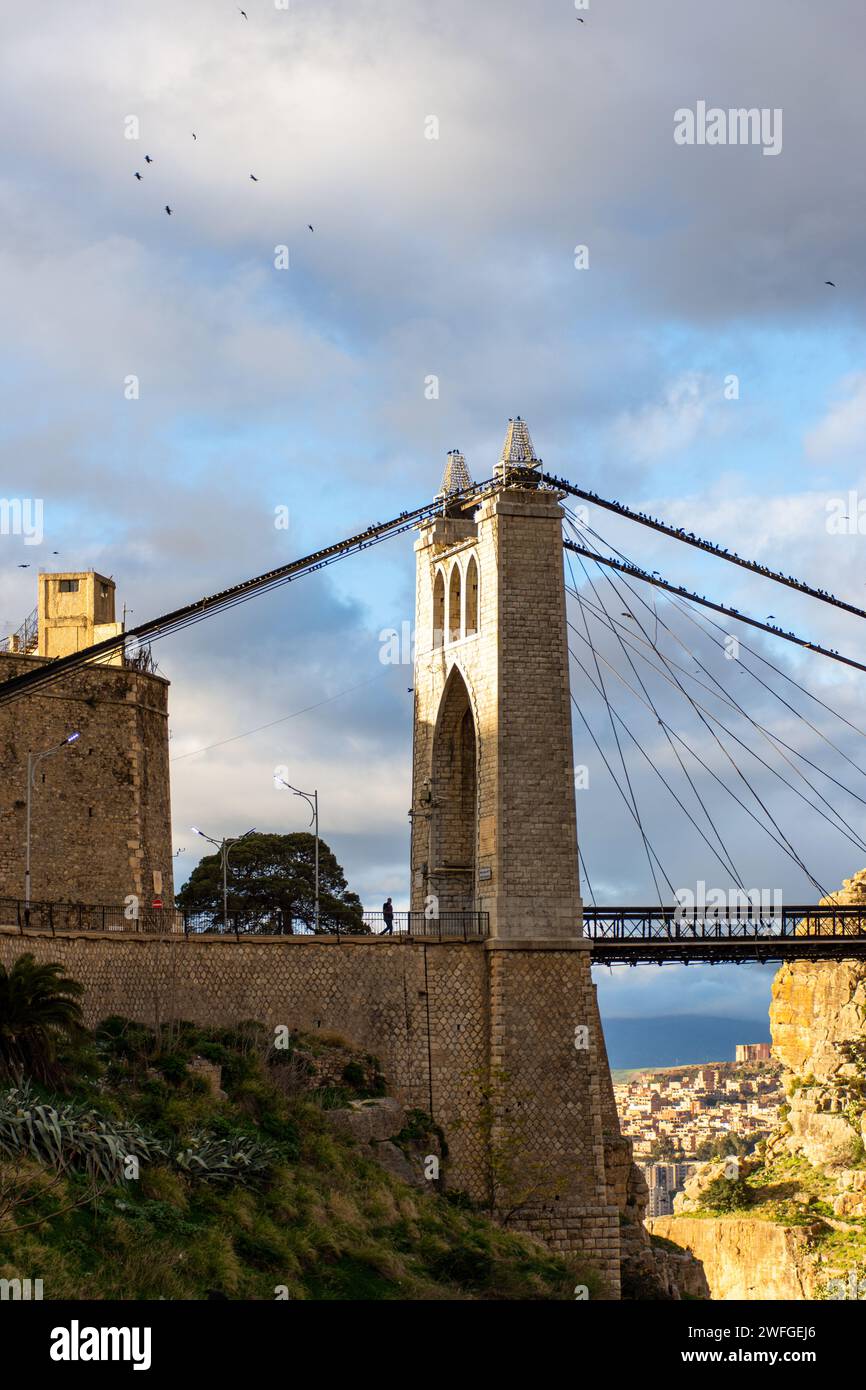 Low-angle view of Sidi M'Cid Bridge the suspension bridge in ...