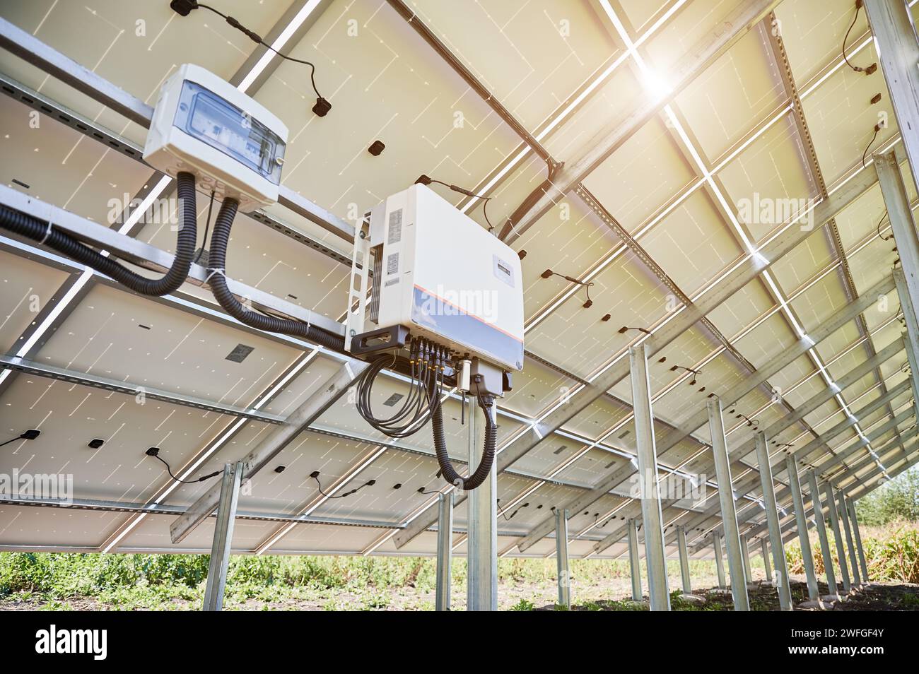 Starting work of solar panel. Solar inverter converting output current ...