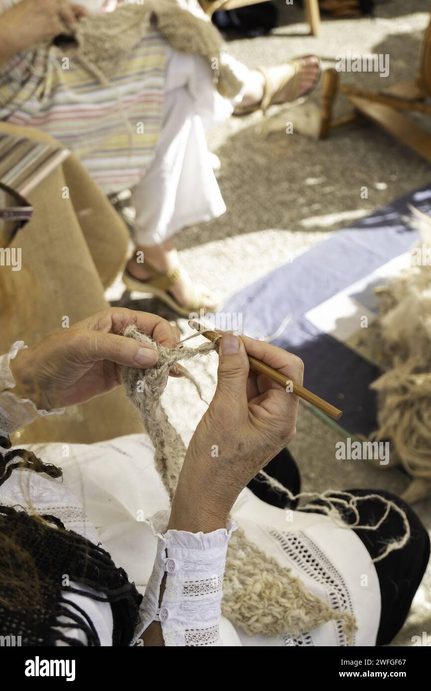Detail of old tradition, weaving clothes by hand in a traditional way ...