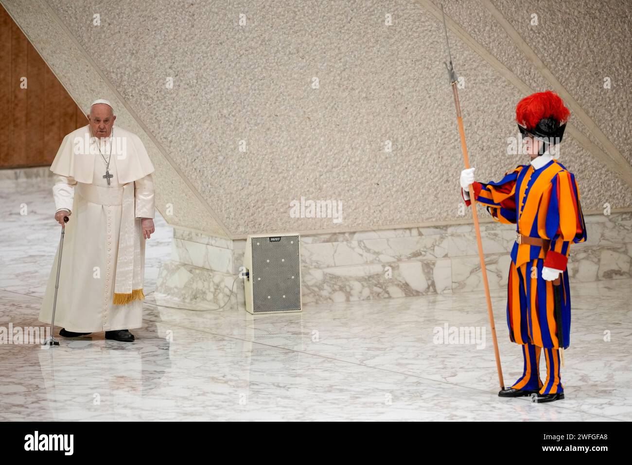 Pope Francis, left, arrives for his weekly general audience in the Pope ...