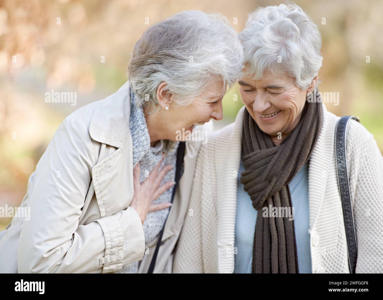 Senior women, talking and laughing in nature for reunion, together and ...