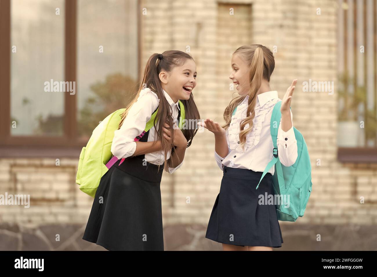 Friends school uniform laughing hi-res stock photography and images - Alamy
