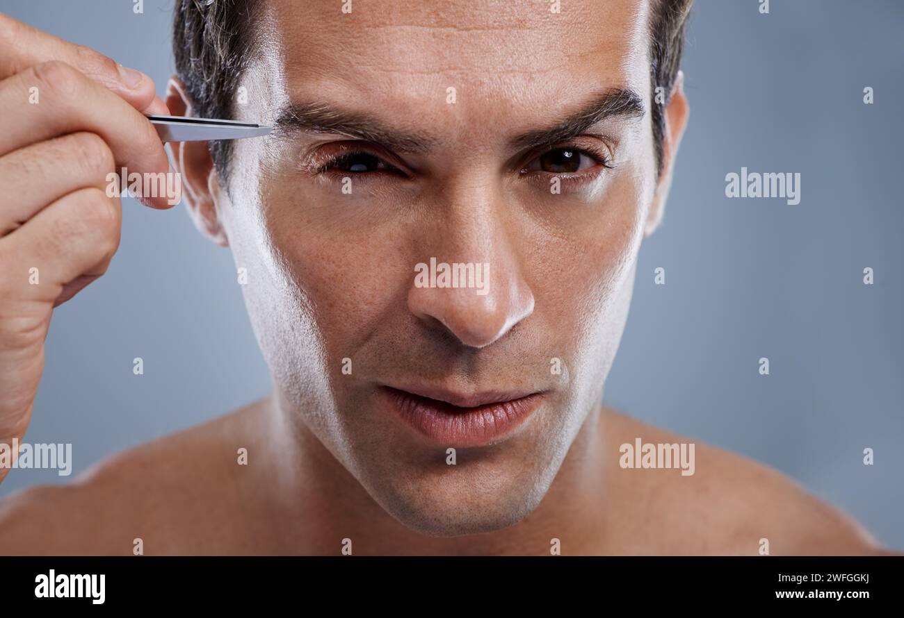 Man, portrait and tweezers for eyebrows or grooming for face clean ...