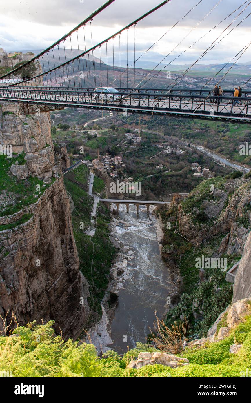 High-angle view of Sidi M'Cid Bridge the suspension bridge across the ...