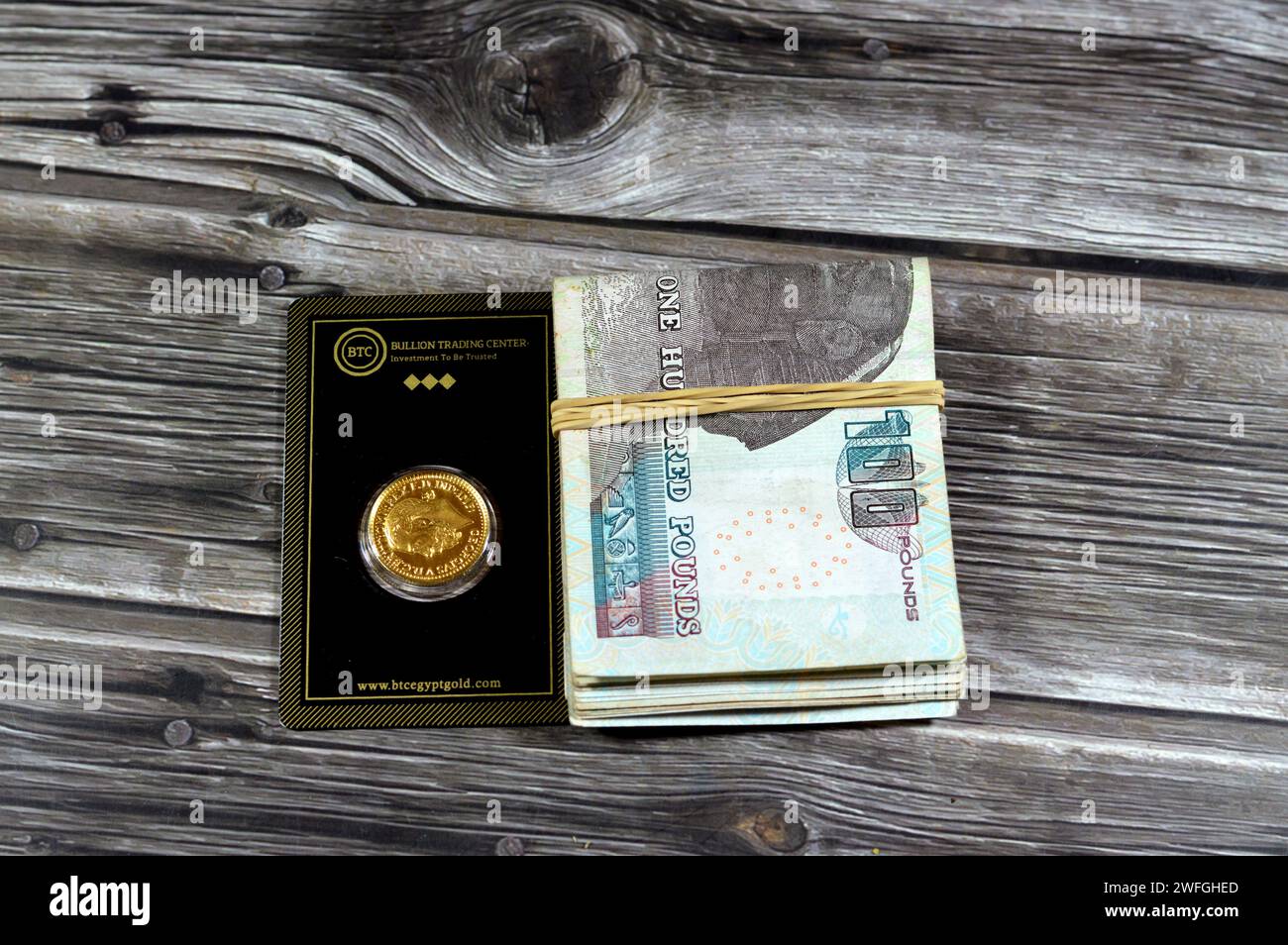 Cairo, Egypt, January 29 2024: Egyptian money pounds and The sovereign ...