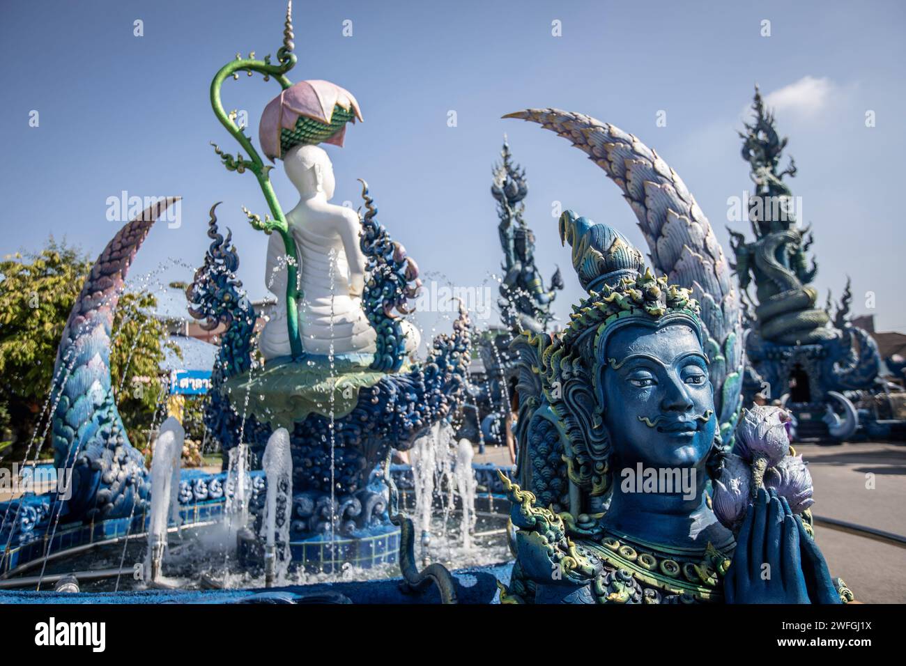 The fountain in front of the Blue Temple. Wat Rong Suea Ten (Temple of ...