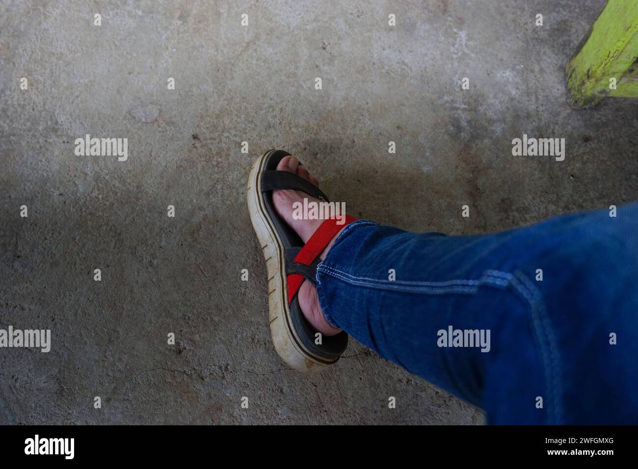 Stock photo of sandals and shoes being worn Stock Photo - Alamy