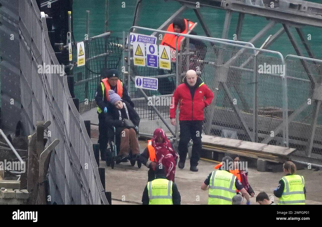 A group of people thought to be migrants are brought in to Dover, Kent ...