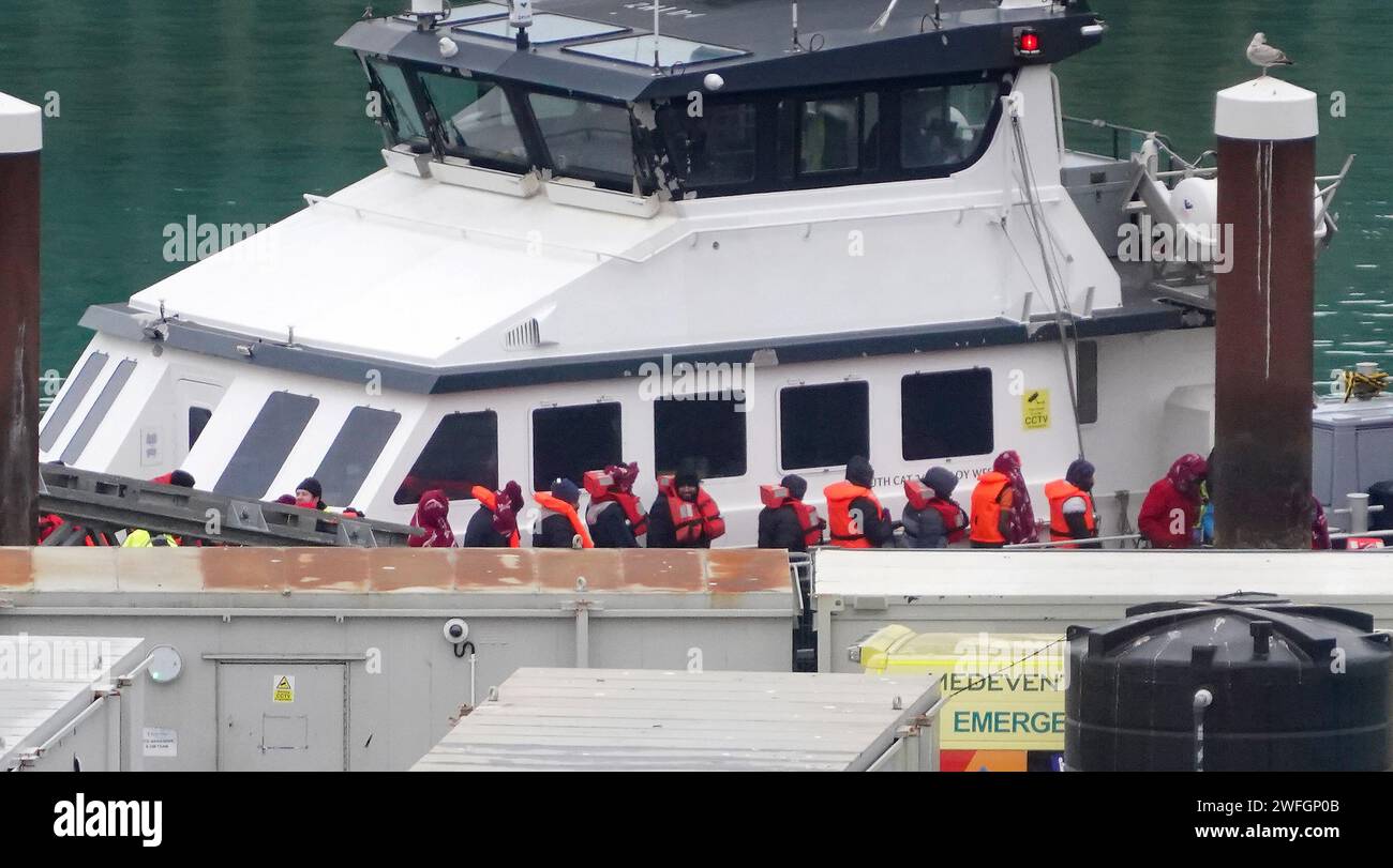 A group of people thought to be migrants are brought in to Dover, Kent, from a Border Force ...