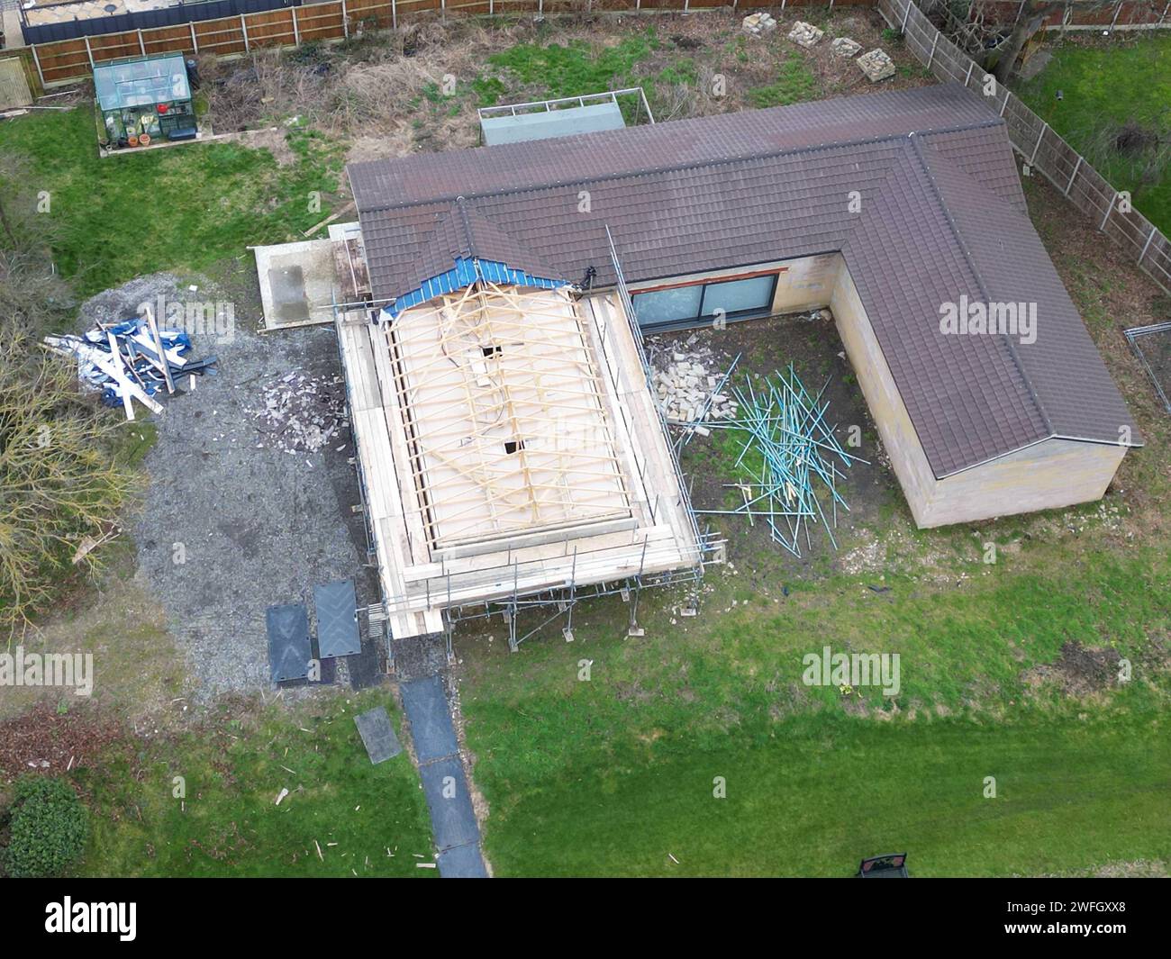 Work continues to demolish an unauthorised spa pool block at the home ...