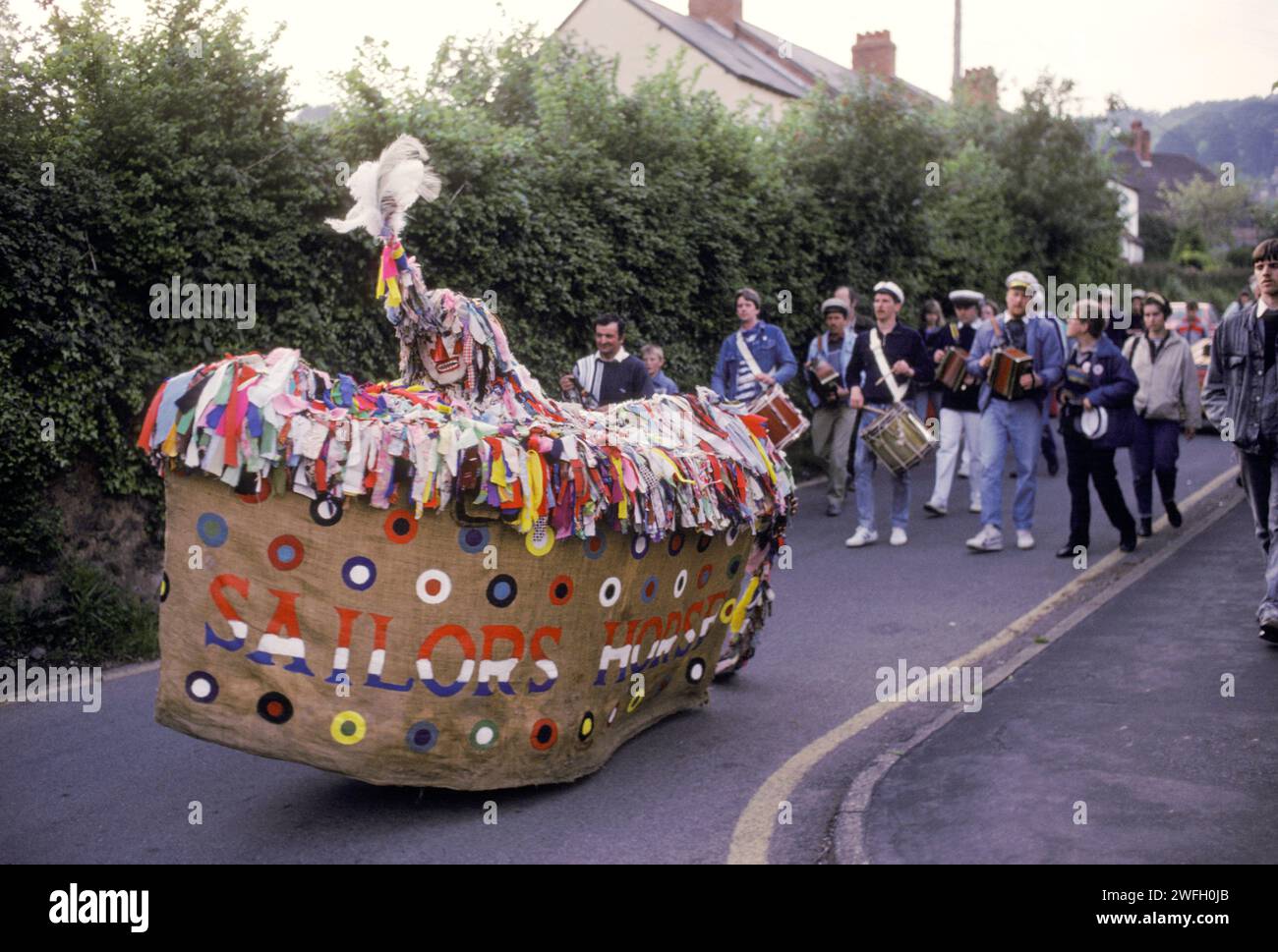 Minehead Hobby Horse UK. May Day at dawn walking to Whitecross where he ...